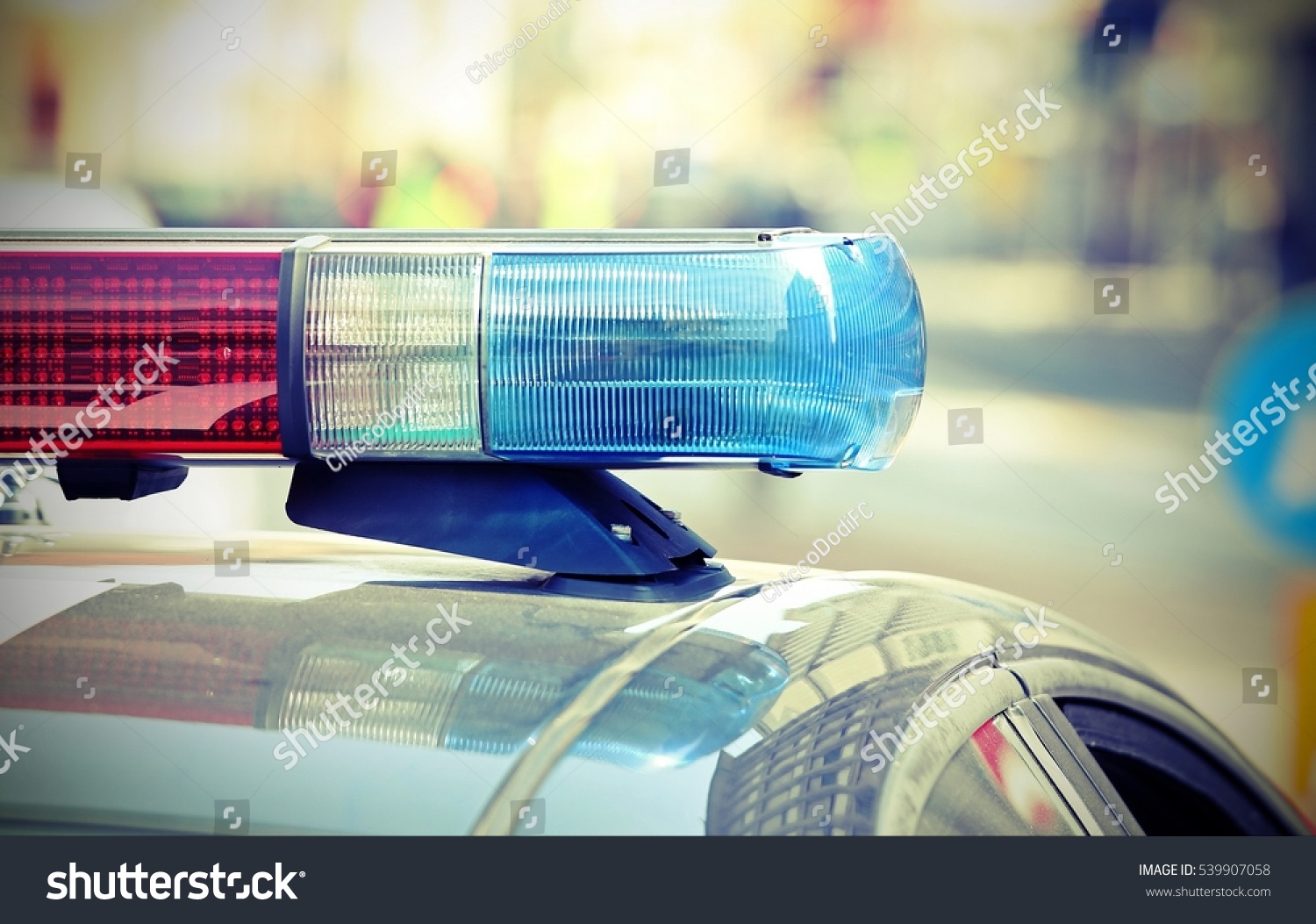 stock-photo-flashing-lights-of-the-police-car-into-the-checkpoint-in ...